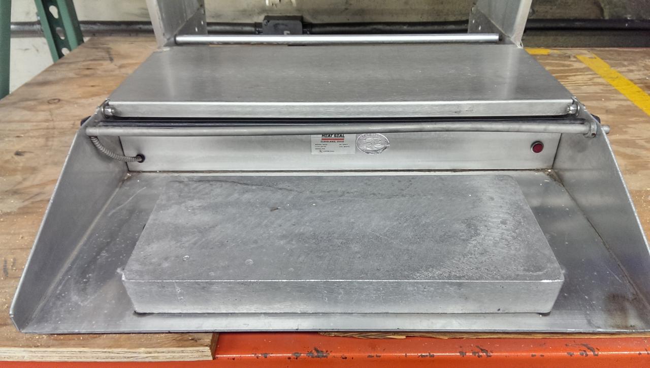 Lot #22: HeatSeal 825A Table Top Wrapper - WireBids